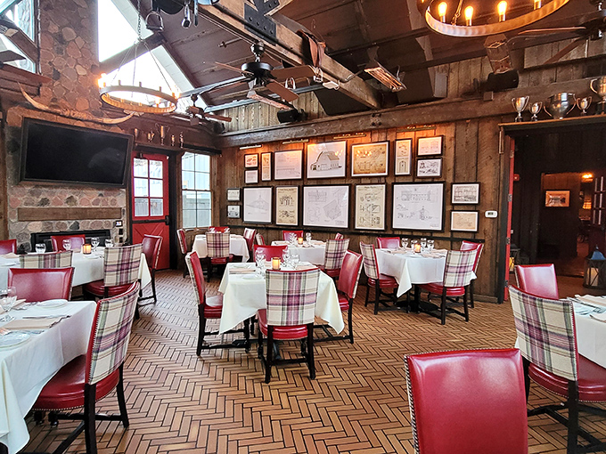 Red leather chairs and plaid accents create the perfect backdrop for the meat sweats you're about to earn. Worth it.