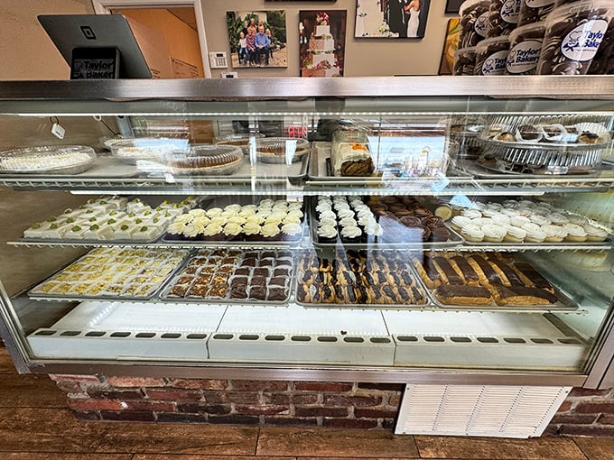The display case—where dreams are made and diets go to die. Each tray a different chapter in the story of indulgence.