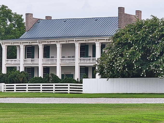 This historic home's columned elegance speaks volumes about antebellum architecture &ndash; Southern grandeur preserved with meticulous care.