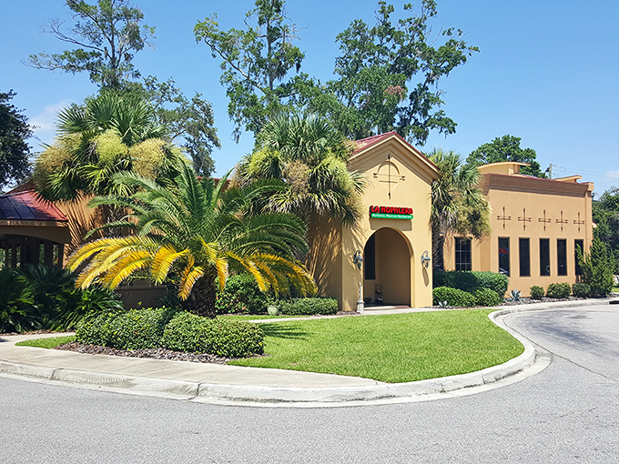 Mediterranean meets Lowcountry in this sun-drenched building where palm trees stand guard like friendly bouncers welcoming you inside.