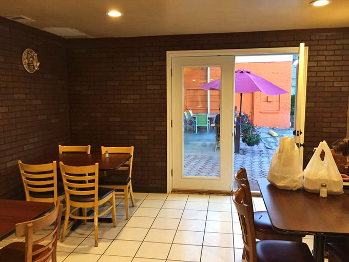 The entrance to flavor town is paved with white tiles and framed by brick walls. Simple, unpretentious, and focused on what matters most.