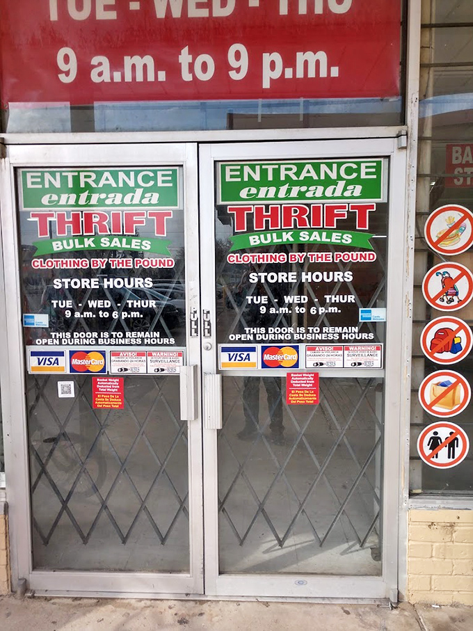 The entrance doors &ndash; humble portals to a parallel universe where $25 can rebuild your entire wardrobe.