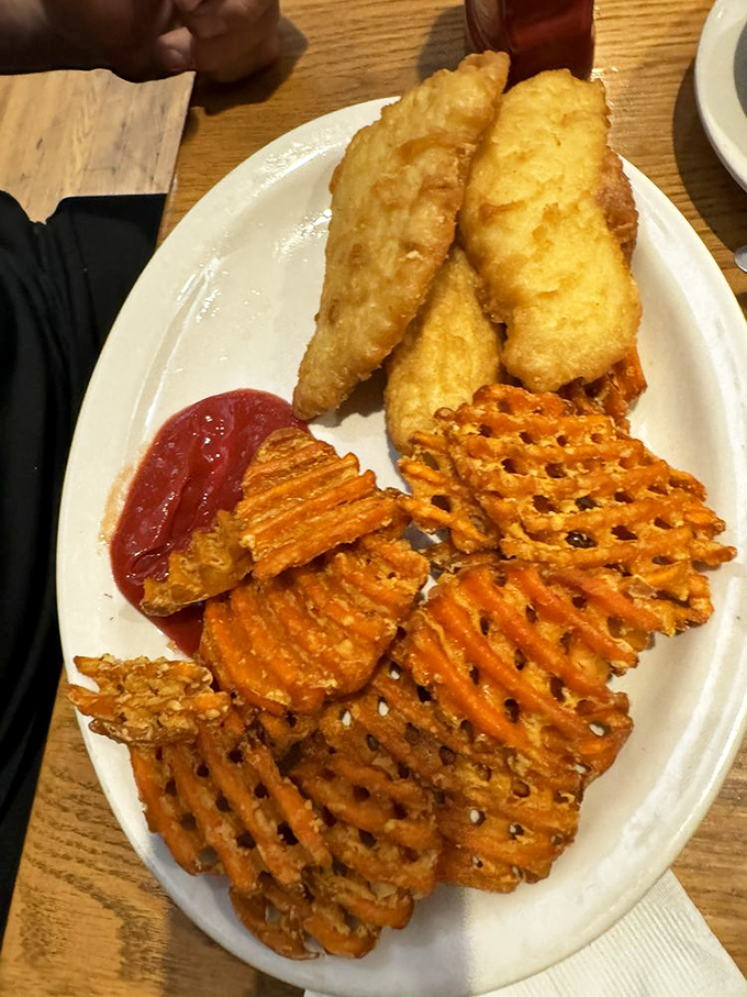 These golden-battered fish filets and waffle fries aren't just food &ndash; they're edible proof that sometimes simple pleasures are the best.