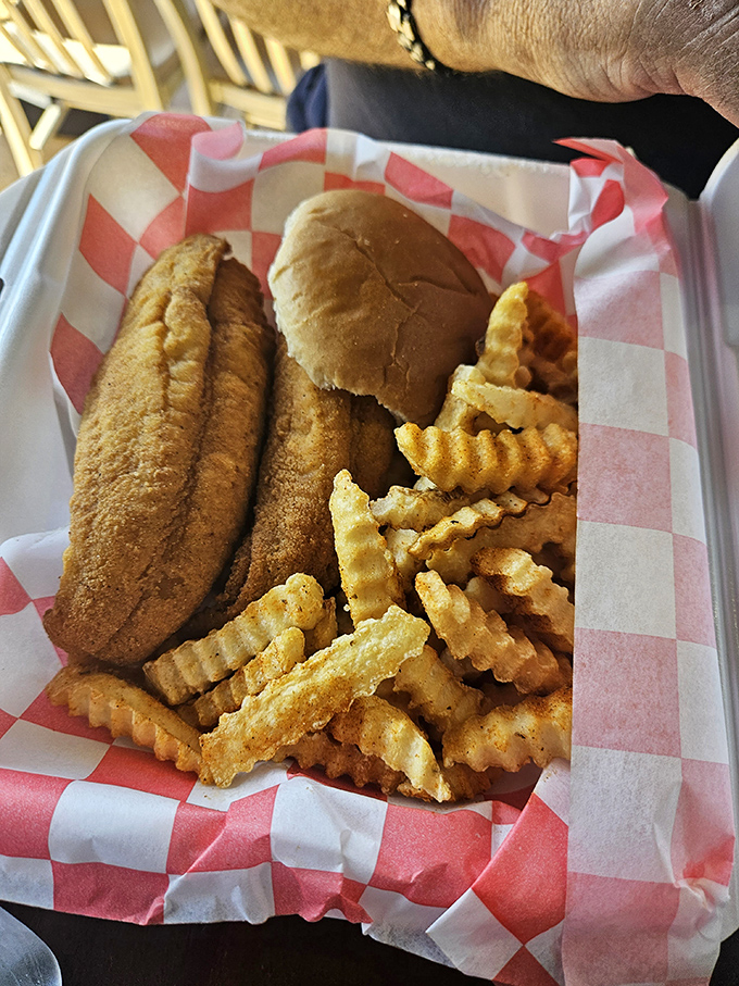 The classic flounder sandwich with crinkle-cut fries &ndash; comfort food that doesn't need to shout to make its delicious point.