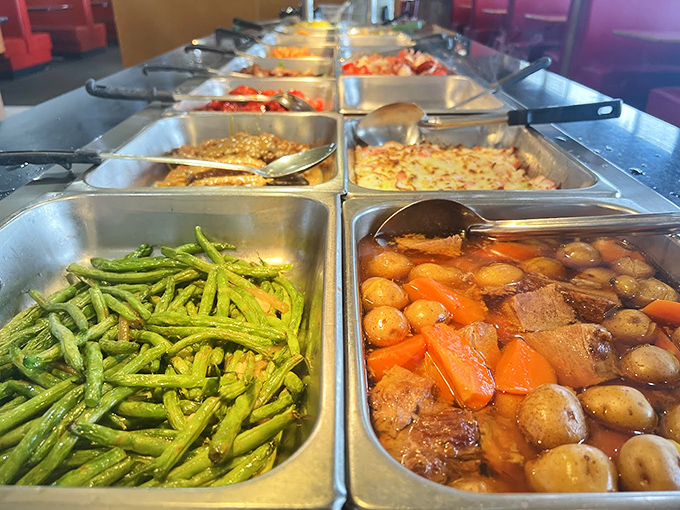 The buffet lineup presents itself like a United Nations of comfort food&mdash;green beans diplomatically sharing space with hearty beef stew.