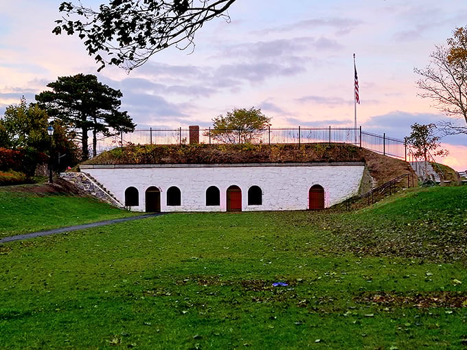Fort Sewall stands as a grassy monument to American resilience, its whitewashed walls and red doors a patriotic postcard come to life.
