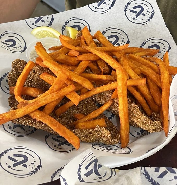 Sweet potato fries and cornmeal-crusted catfish&mdash;a combination so perfect it should have its own holiday. The golden-orange hue is nature's way of saying "eat me."