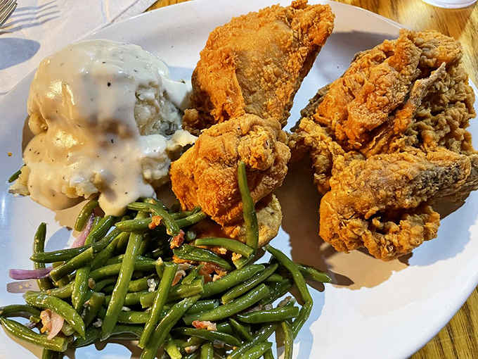 Fried chicken so golden and crispy it practically auditions for its own Food Network show, with green beans playing the perfect supporting role.