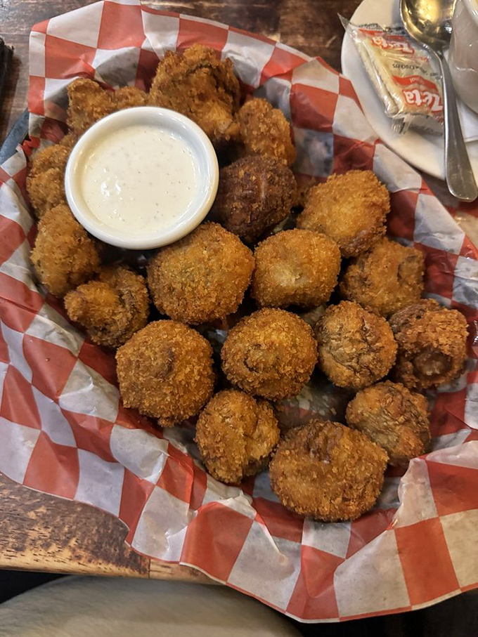 Golden-brown mushroom nuggets that crunch like autumn leaves. The dipping sauce is standing by, ready for its supporting role in this flavor production.