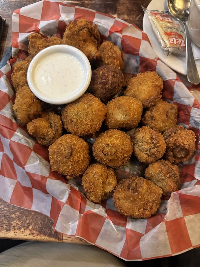 These golden-fried mushrooms aren't just appetizers – they're little umami bombs waiting to explode with flavor. The dipping sauce is just showing off.
