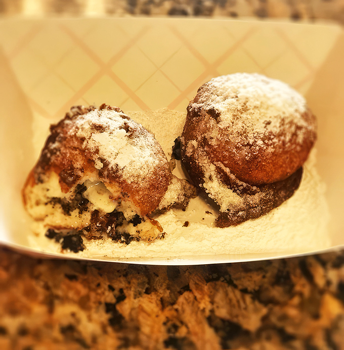 Fried Oreos dusted with powdered sugar&mdash;because sometimes dessert needs to break all the rules and live a little.