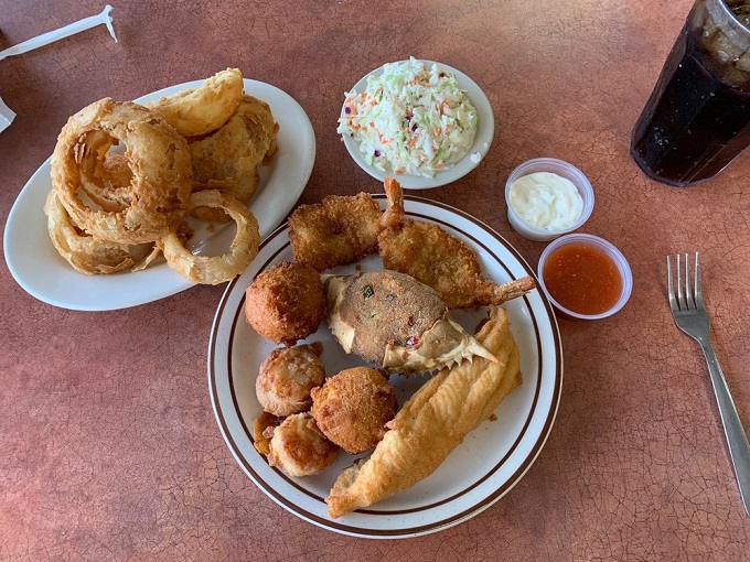 This isn't just a fried seafood platter&mdash;it's an edible treasure chest where each golden morsel holds the ocean's secrets.