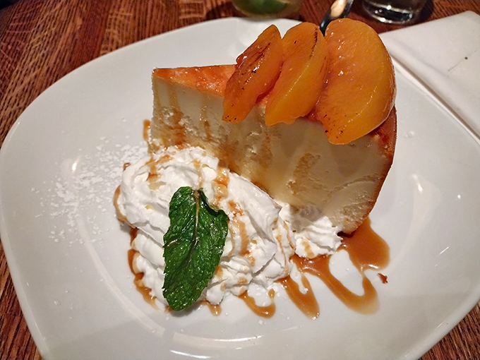 Georgia-style cheesecake with caramelized peaches&mdash;where New York tradition meets Southern charm in the most delicious diplomatic summit imaginable.