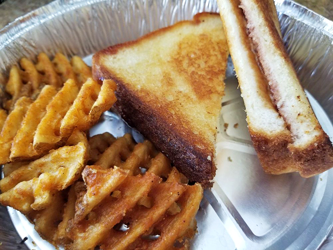 Childhood nostalgia meets grown-up execution&mdash;this grilled PB&J with waffle fries is comfort food's graduation ceremony.