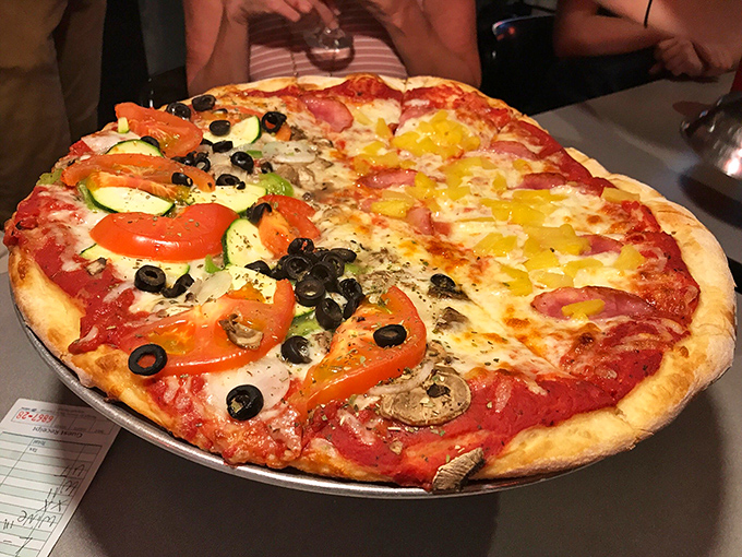 Can't decide between Hawaiian and veggie? This half-and-half masterpiece is diplomacy in pizza form, preventing family feuds one slice at a time.