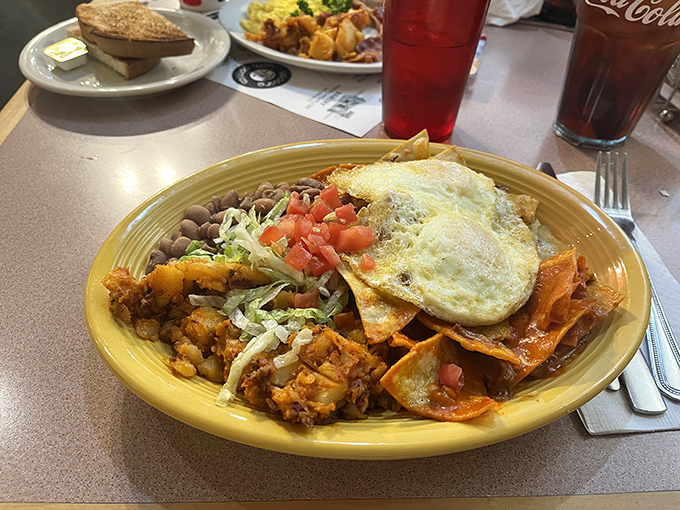 Huevos Rancheros: where eggs get dressed in their Sunday best with crispy tortillas, beans, and enough chile to wake up your taste buds.