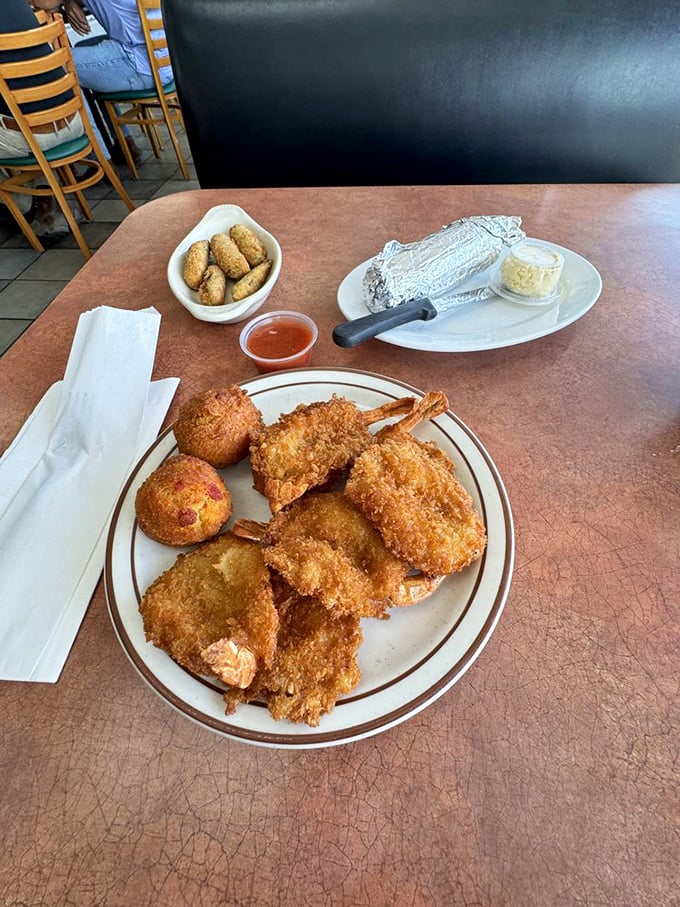 Golden-fried perfection that makes you wonder if the chef has some secret pact with the breading gods. Worth every napkin.