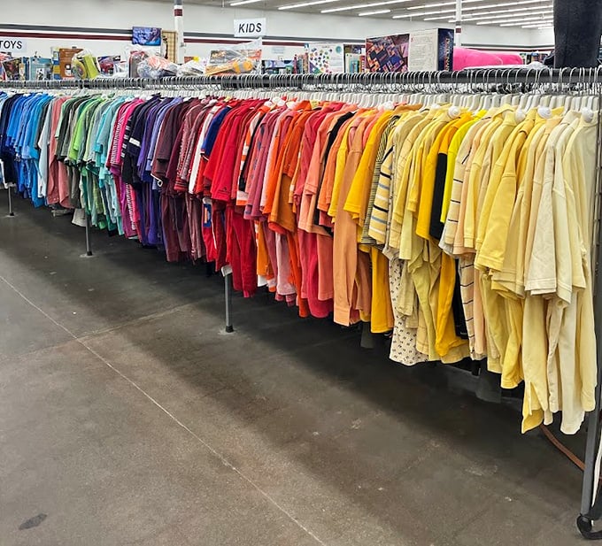 The children's clothing section explodes with color-coded possibilities&mdash;a rainbow of options arranged with surprising military precision.
