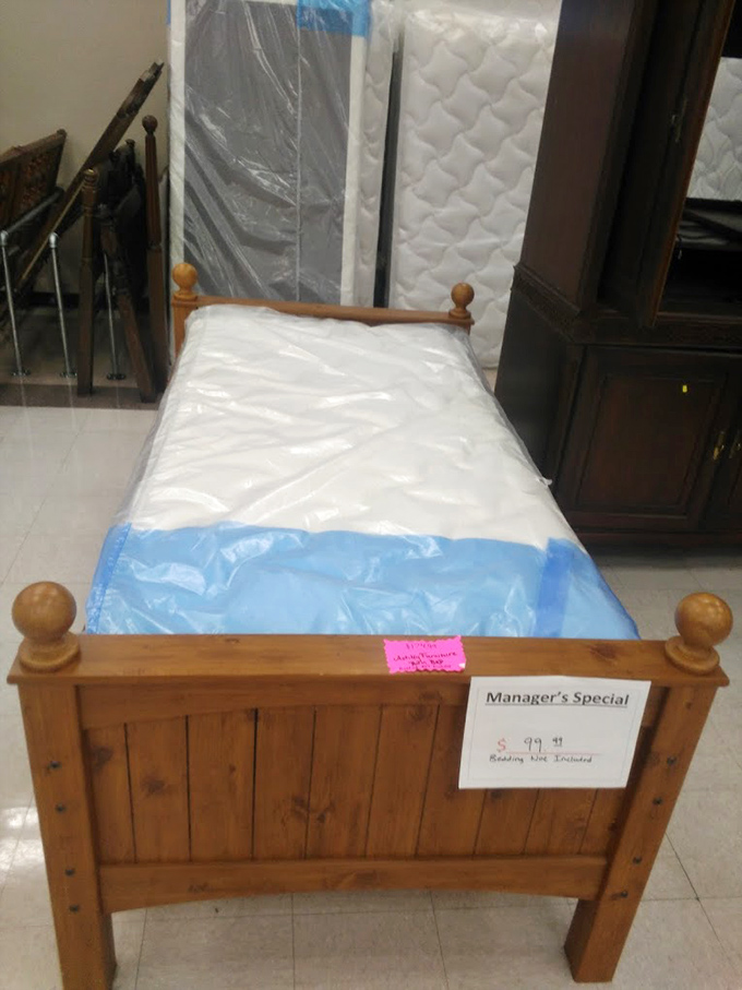 A rustic twin bed with fresh mattress awaits its next dreamer. Perfect for a guest room or that child who insists they're "practically a teenager now."