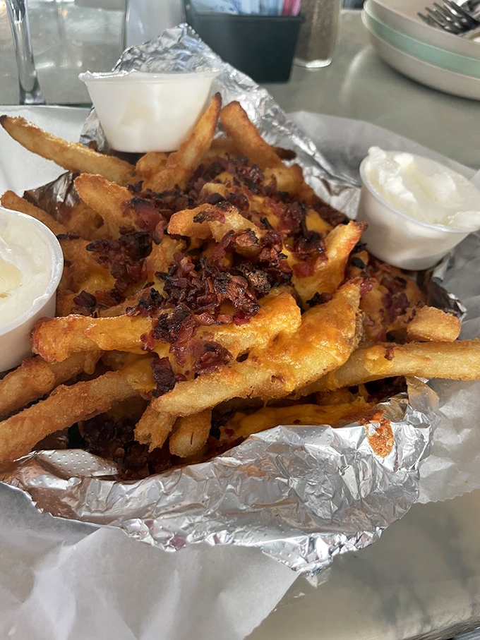 These aren't just fries&mdash;they're a commitment. Loaded with cheese, bacon, and enough toppings to qualify as their own food group.