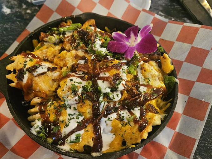 These aren't just loaded fries&mdash;they're an architectural achievement with cheese, bacon, and scallions playing structural support roles.