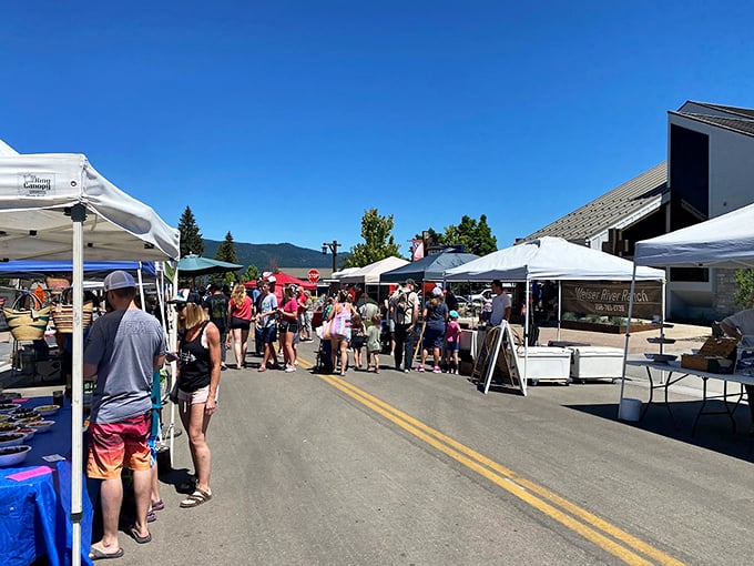 The farmers market transforms ordinary streets into a bustling showcase of local bounty. Where else can you buy huckleberry jam while mountain gazing?