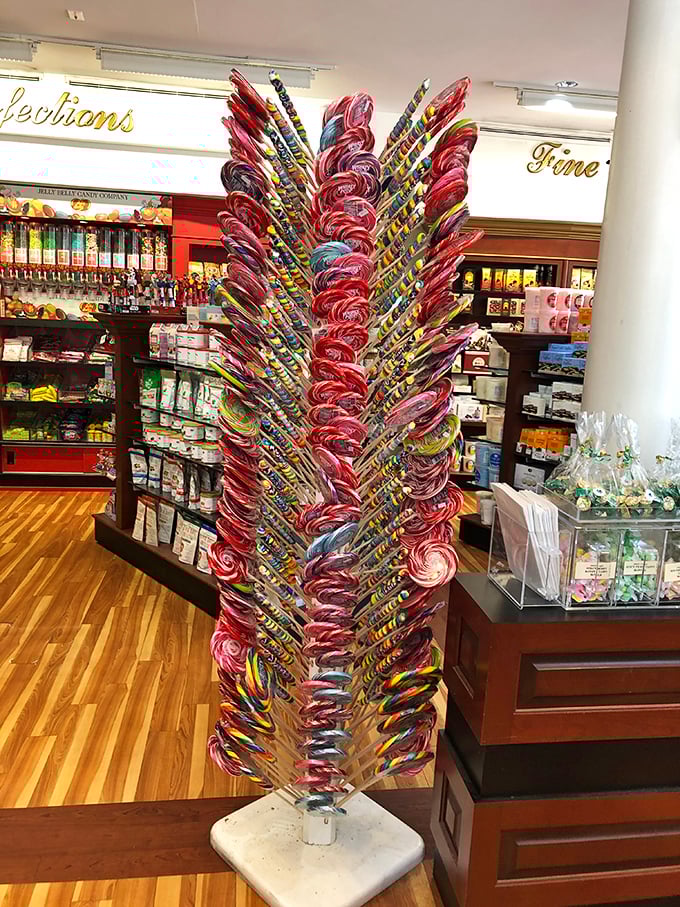 This lollipop tree isn't just store decoration&mdash;it's practically a modern art installation celebrating the spiral geometry of pure sugar joy.