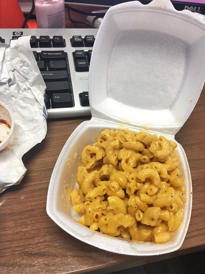 Mac and cheese so gloriously yellow it could guide ships through fog. Comfort food that whispers, "Diet plans are just suggestions anyway."