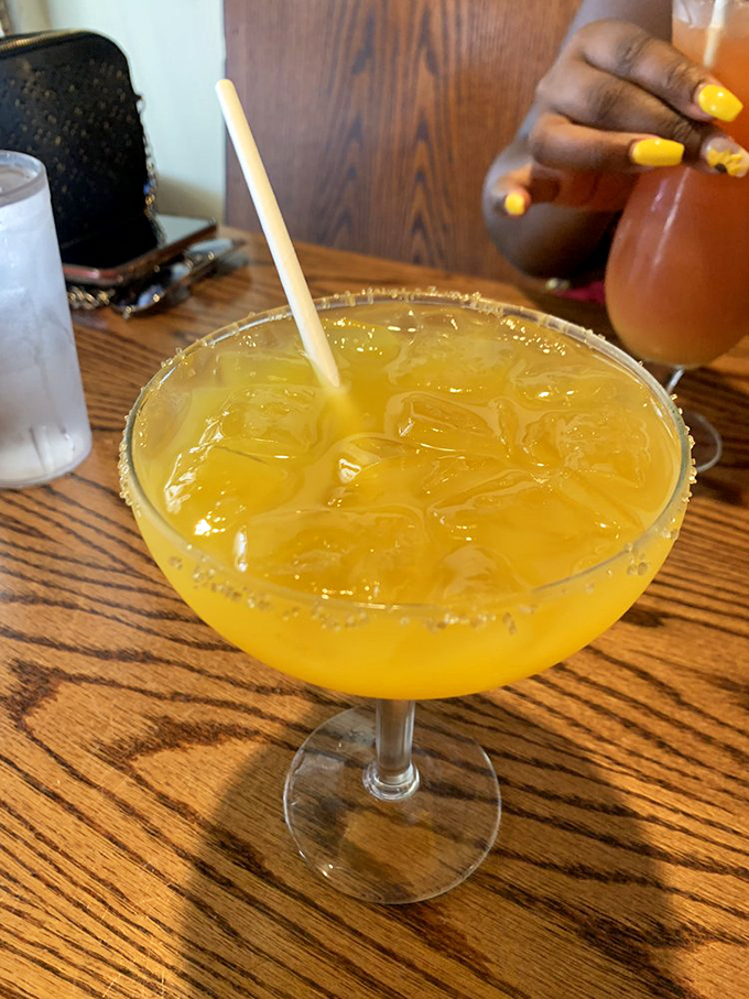 Sunshine in a glass! This mango margarita delivers tropical vacation vibes with each sip, no matter the season outside.