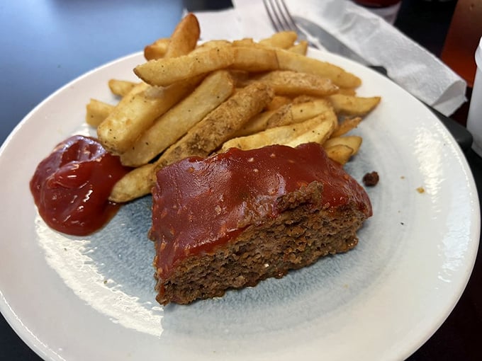 Meatloaf that would make your mother both jealous and proud, flanked by fries that didn't come from a freezer but from actual potatoes.