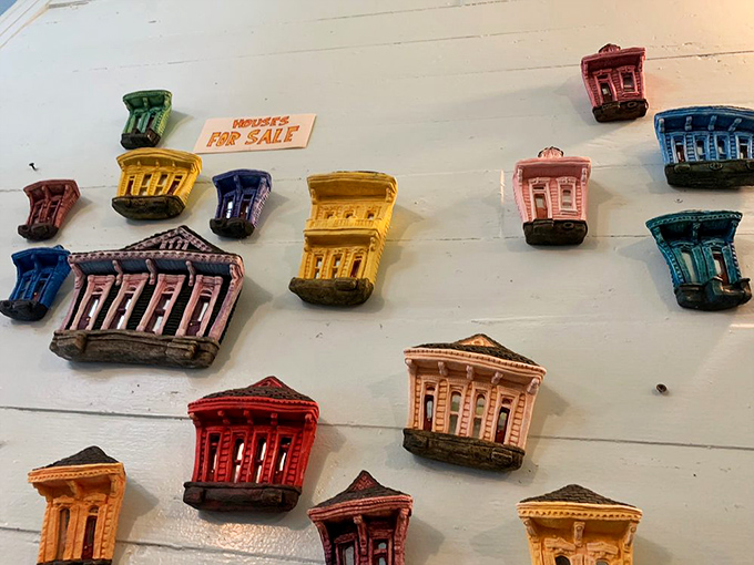 A wall of colorful New Orleans shotgun houses for sale&mdash;the only real estate most of us can afford in this neighborhood.