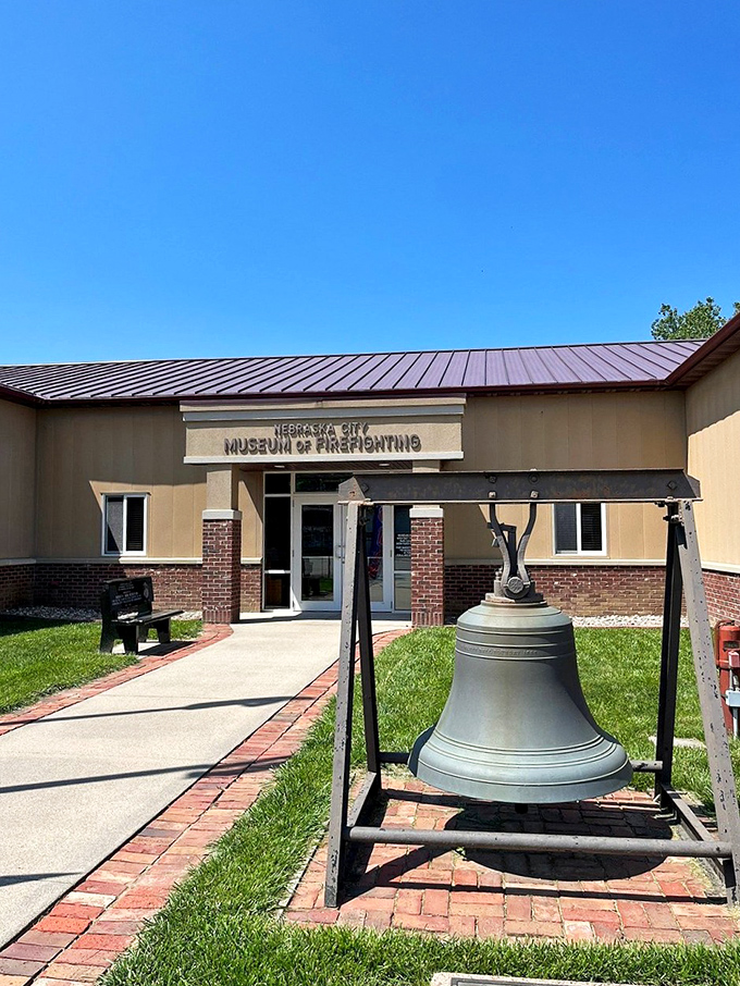 The Nebraska City Museum of Firefighting stands guard with its historic bell &ndash; a reminder of when alarms were analog and heroes wore suspenders.