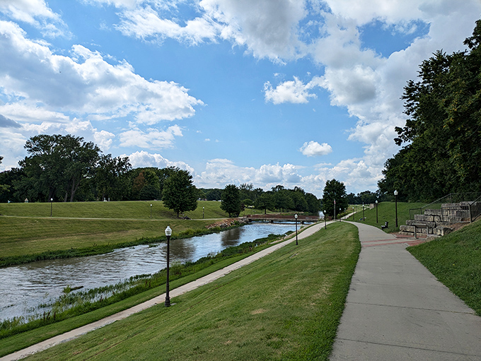 The Neosho Riverwalk offers a slice of serenity where water, sky, and greenery create nature's perfect sandwich.