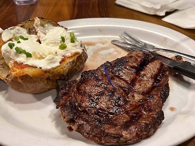 This top sirloin with loaded baked potato isn't just dinner&mdash;it's a celebration of why steakhouses will never go out of style.