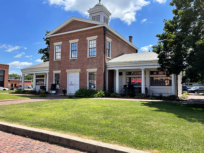 This Greek Revival gem once buzzed with market transactions but now preserves history with the same dignity as your aunt protecting her fine china.