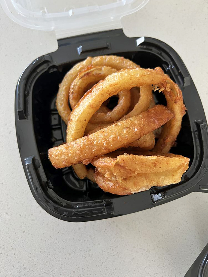 Onion rings with the ideal crunch-to-onion ratio. Like edible halos for the barbecue faithful.