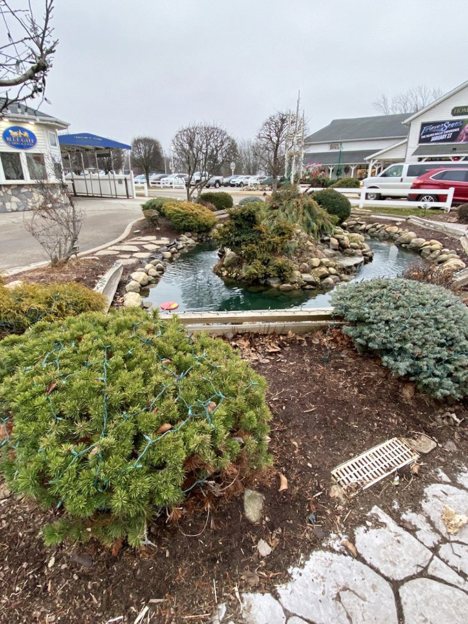 The welcoming front porch adorned with vibrant flowers invites you to slow down, just like the Amish have been doing for generations.