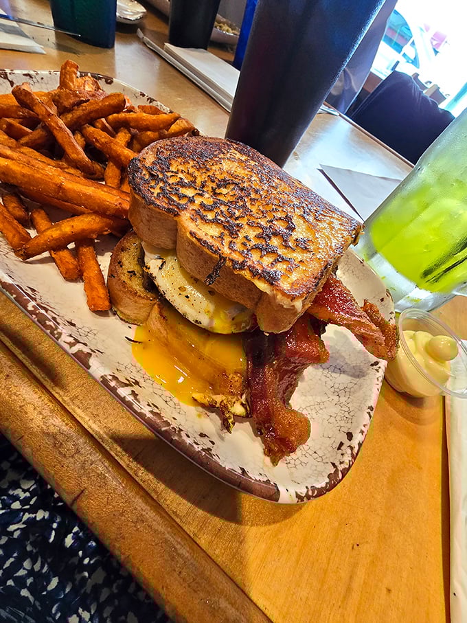 The patty melt &ndash; where burger meets grilled cheese in a beautiful relationship that's seared to perfection and served with sweet potato fries.