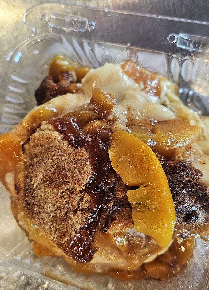 Peach cobbler reimagined as a cinnamon roll? The fruit-cinnamon-caramel trifecta that makes you wonder why this isn't everywhere.