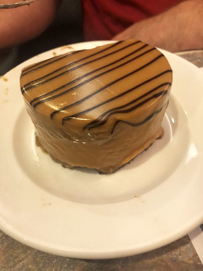 Peanut butter cake with chocolate drizzle&mdash;where childhood nostalgia meets grown-up indulgence in a perfect pact of deliciousness.