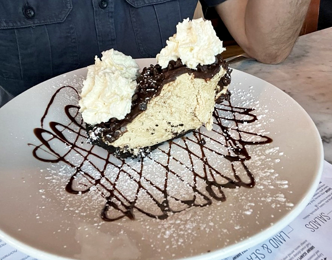 The peanut butter pie with its chocolate drizzle isn't just dessert&mdash;it's the sweet finale that makes you forget you came for seafood in the first place.