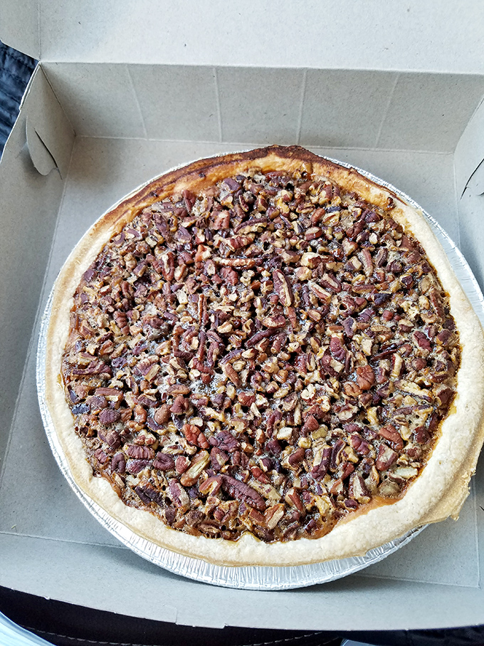 Pecan pie that deserves its own display case at the Louvre. That golden ratio of nuts to gooey filling is mathematical perfection.