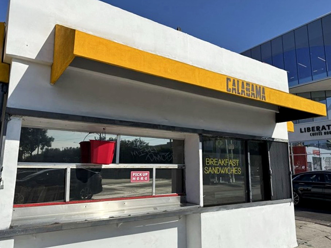 The pickup window: where hopes and dreams are exchanged for breakfast sandwiches. Worth every minute in line.