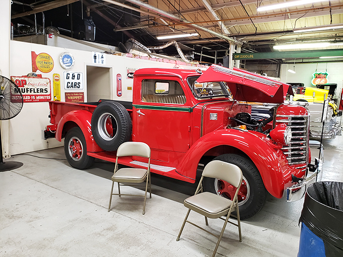 This cherry-red vintage pickup shows that working vehicles deserved style too. American utility never looked so good in its Sunday best.
