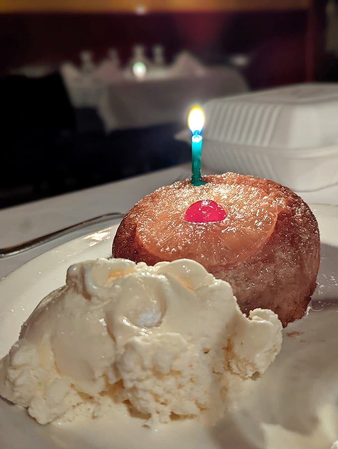 A birthday-worthy pineapple upside-down cake with ice cream&mdash;nostalgia you can eat, complete with celebratory candle.