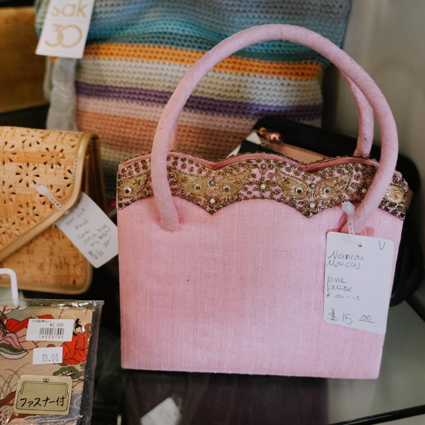 A pretty-in-pink purse that screams "take me to brunch!" Neiman Marcus quality without the Neiman Marcus anxiety.