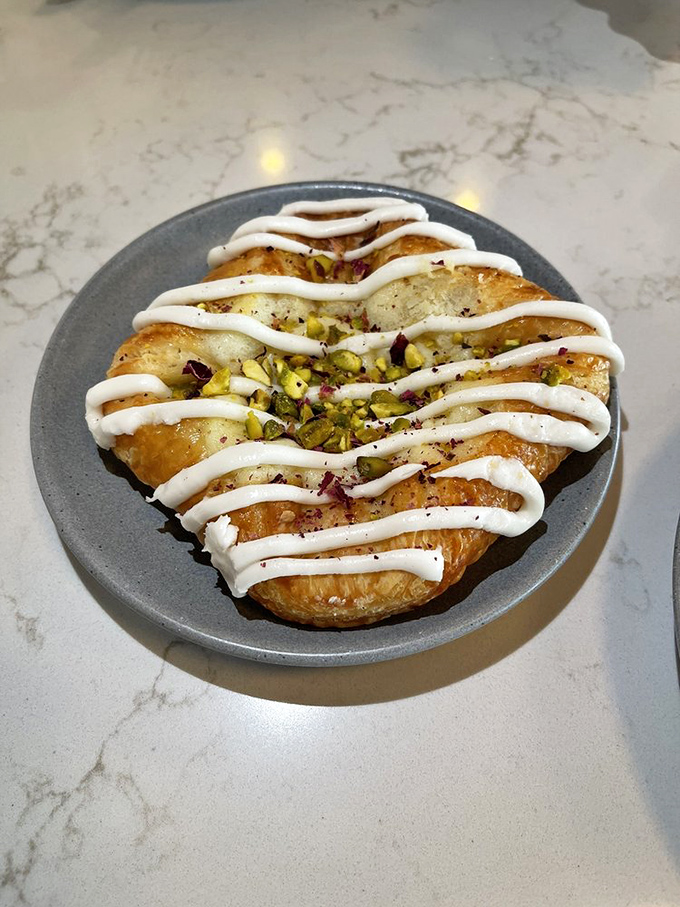 Not just a pastry&mdash;a golden, flaky landscape drizzled with cream and studded with pistachios like edible emeralds.