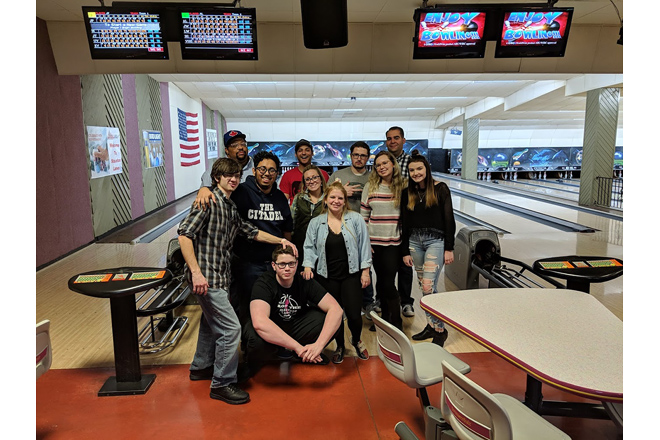 These aren't just bowlers; they're a community bound by shared strikes, gutter balls, and the unspoken understanding that bowling night is sacred.