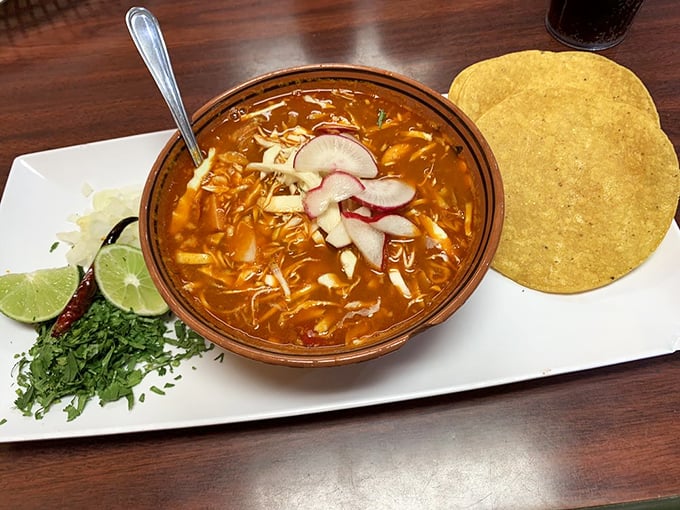 This pozole is a party in a bowl&mdash;radishes, lime, and cilantro dancing atop a spicy broth. Comfort food that hugs you from the inside out.