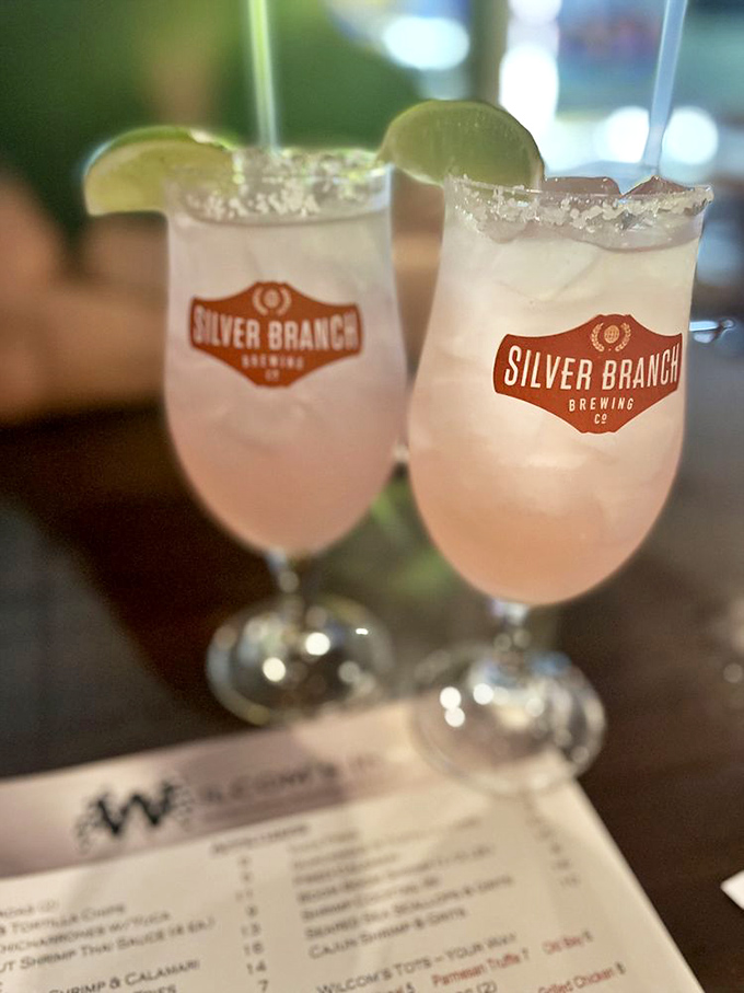 These prickly pear cocktails from Silver Branch Brewing aren't just drinks; they're liquid sunset in a glass, complete with lime life preservers.